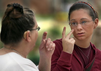Brain Processes Sign Language Similar to Spoken Language - Language ...